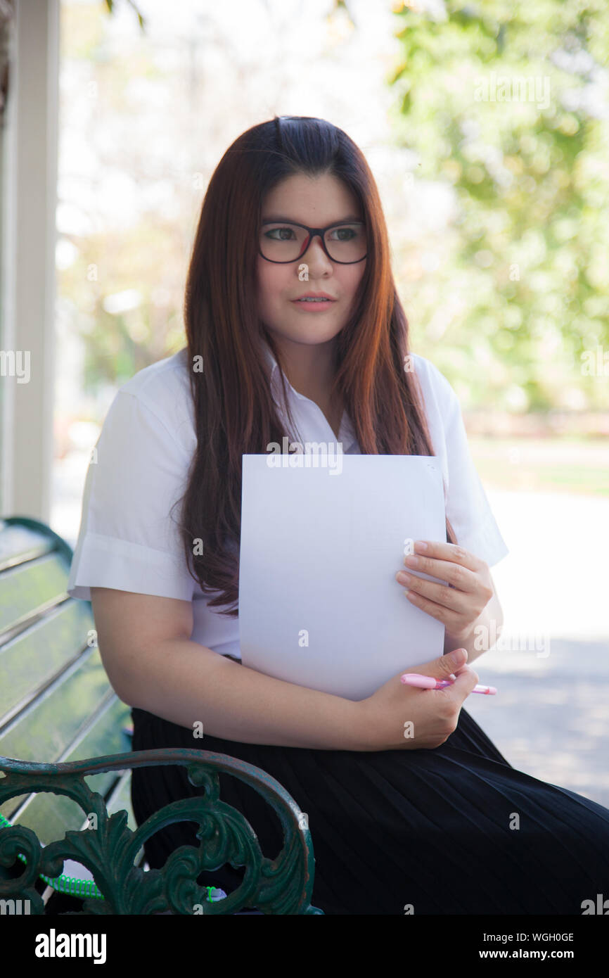 Student on bench hi-res stock photography and images - Alamy