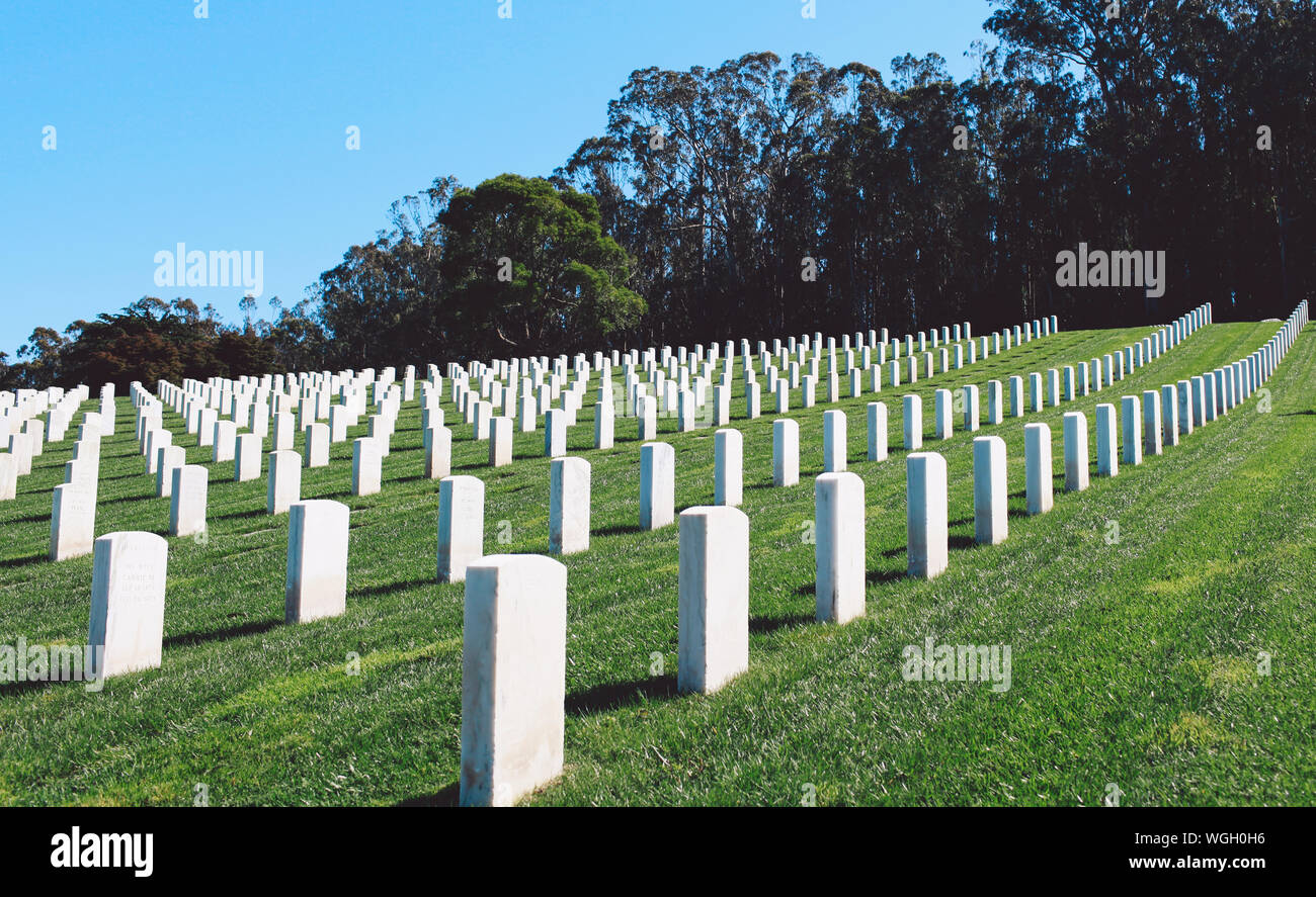 White Tombstones At Cemetery Stock Photo - Alamy