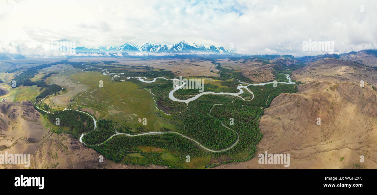 Kurai steppe and Chuya river on North-Chui ridge background. Altai ...