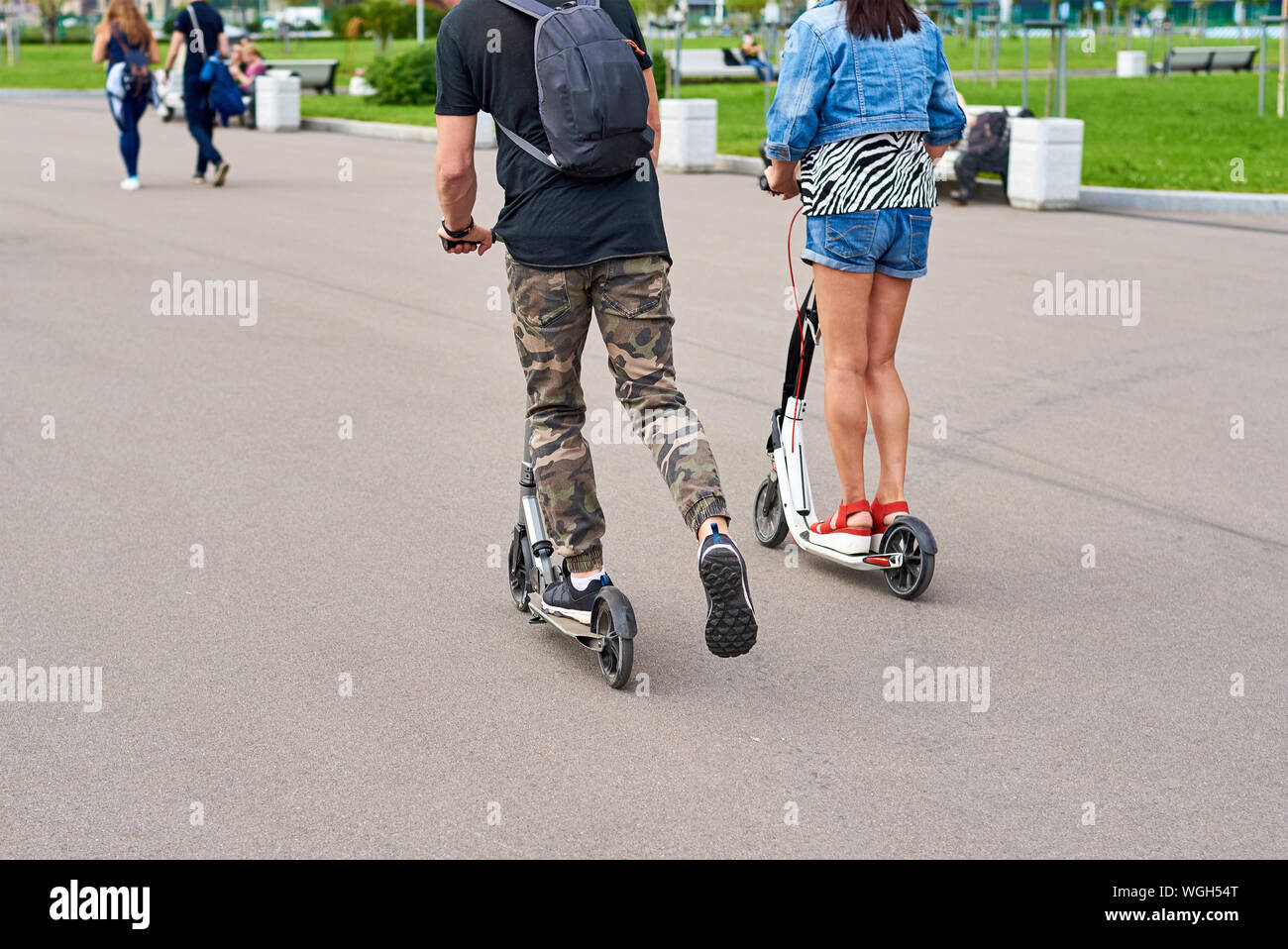 Ride electric scooters hi-res stock photography and images - Alamy