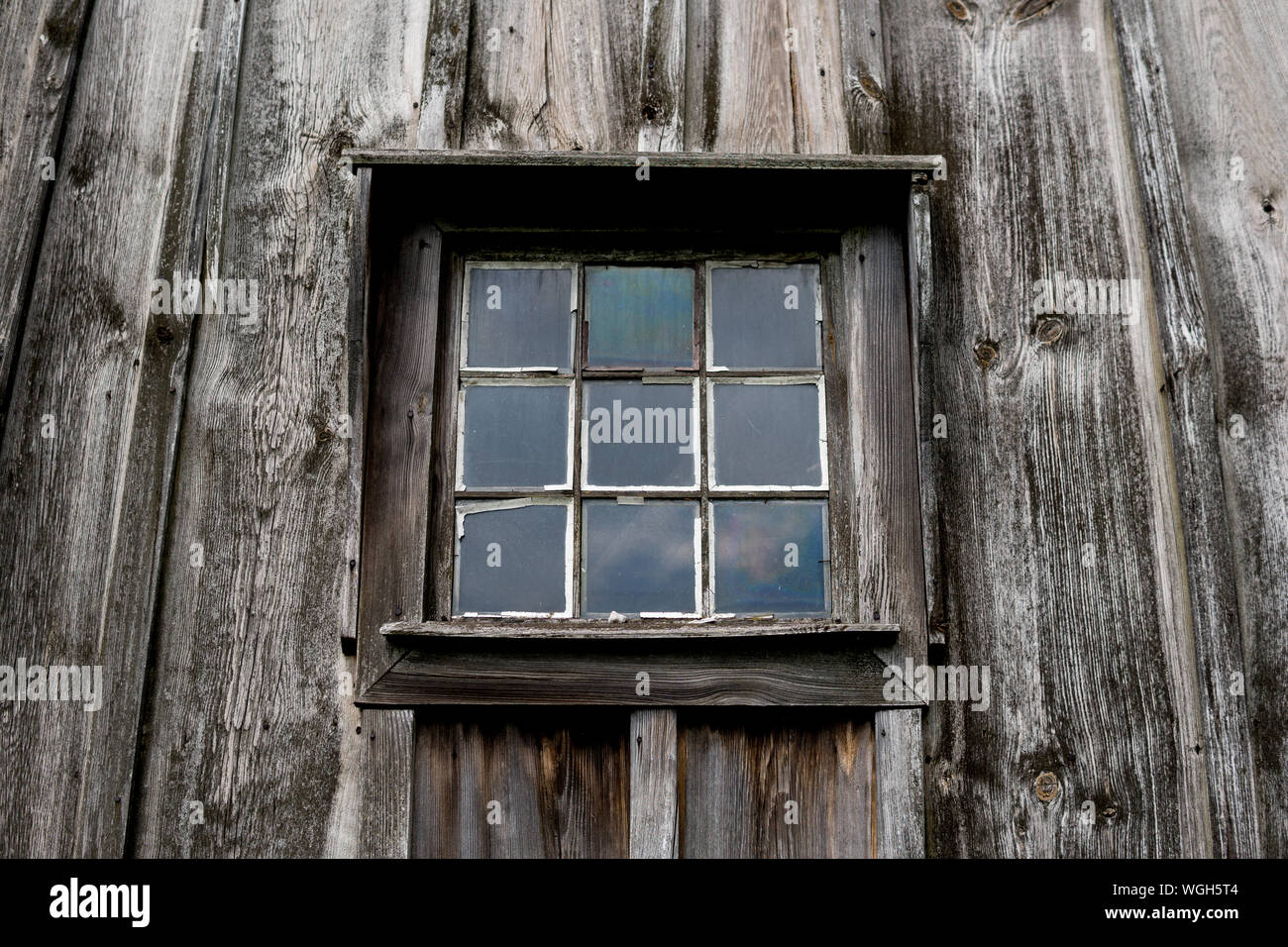 detail of old vintage window with square glasses over wooden wall Stock ...