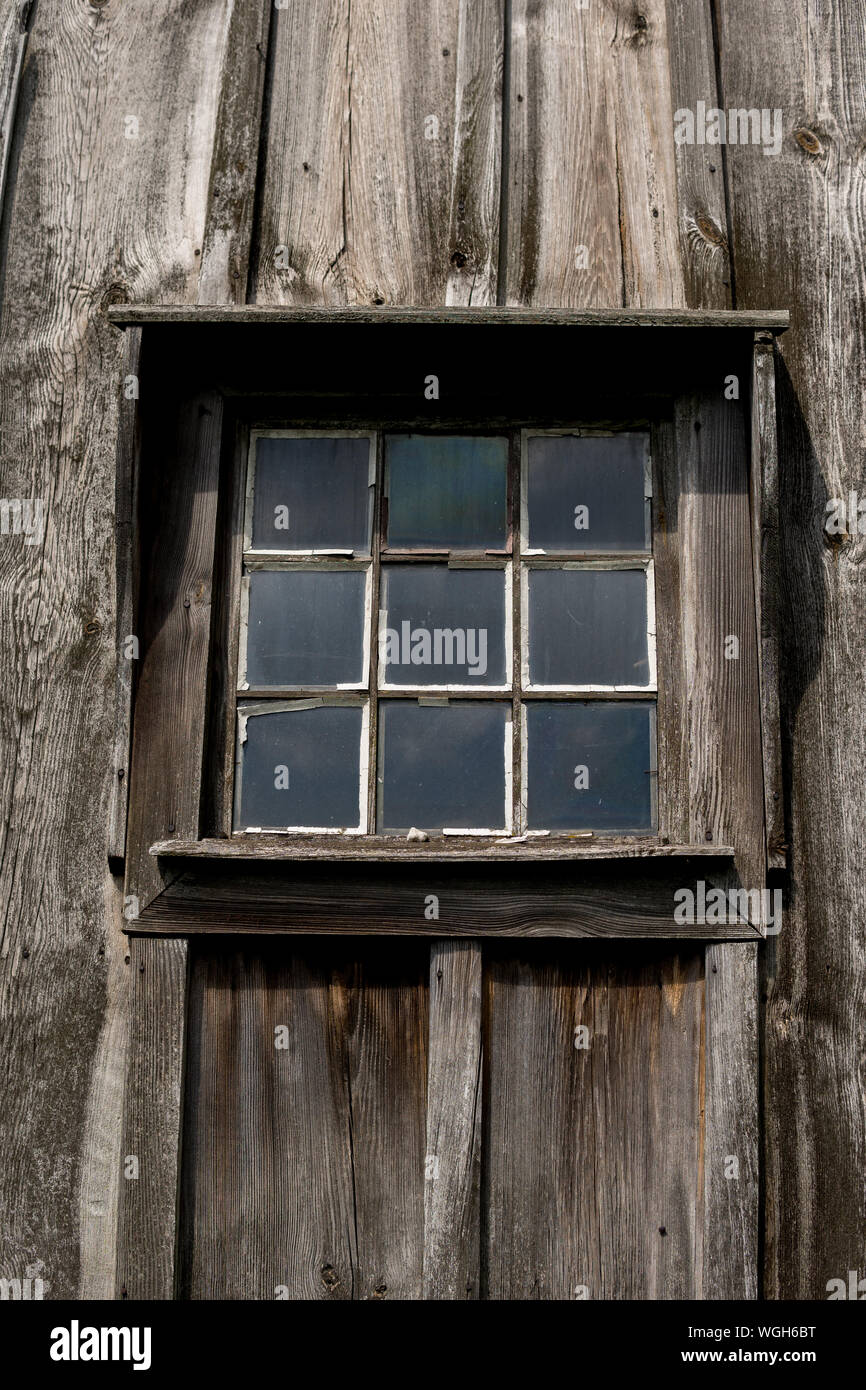 detail of old vintage window with square glasses over wooden wall Stock ...