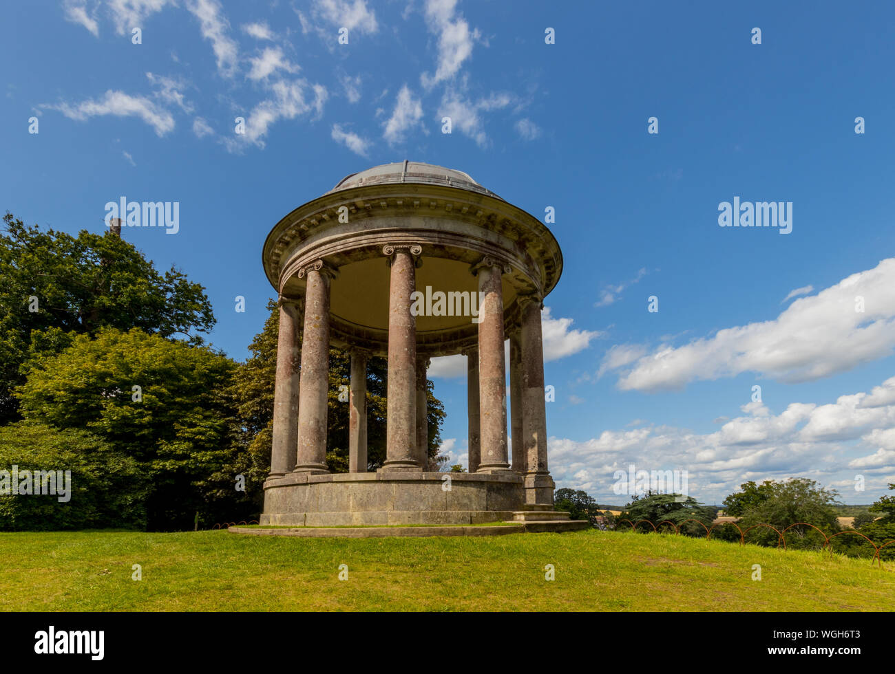 The rotunda under a blue sky at Petworth Park, West Sussex, UK Stock ...