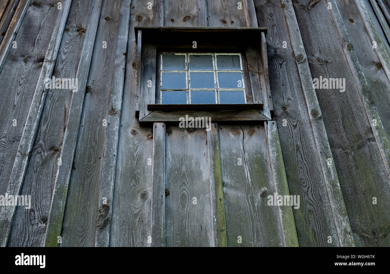 detail of old vintage window with square glasses over wooden wall Stock ...
