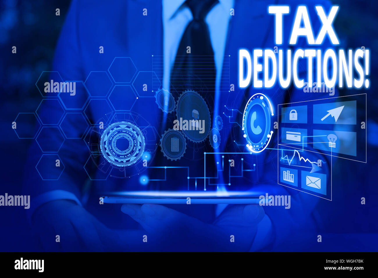 Writing note showing Tax Deductions. Business concept for reduction ...