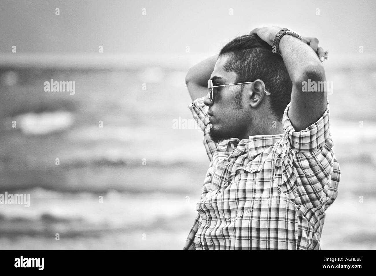 Man hands behind head hi-res stock photography and images - Alamy