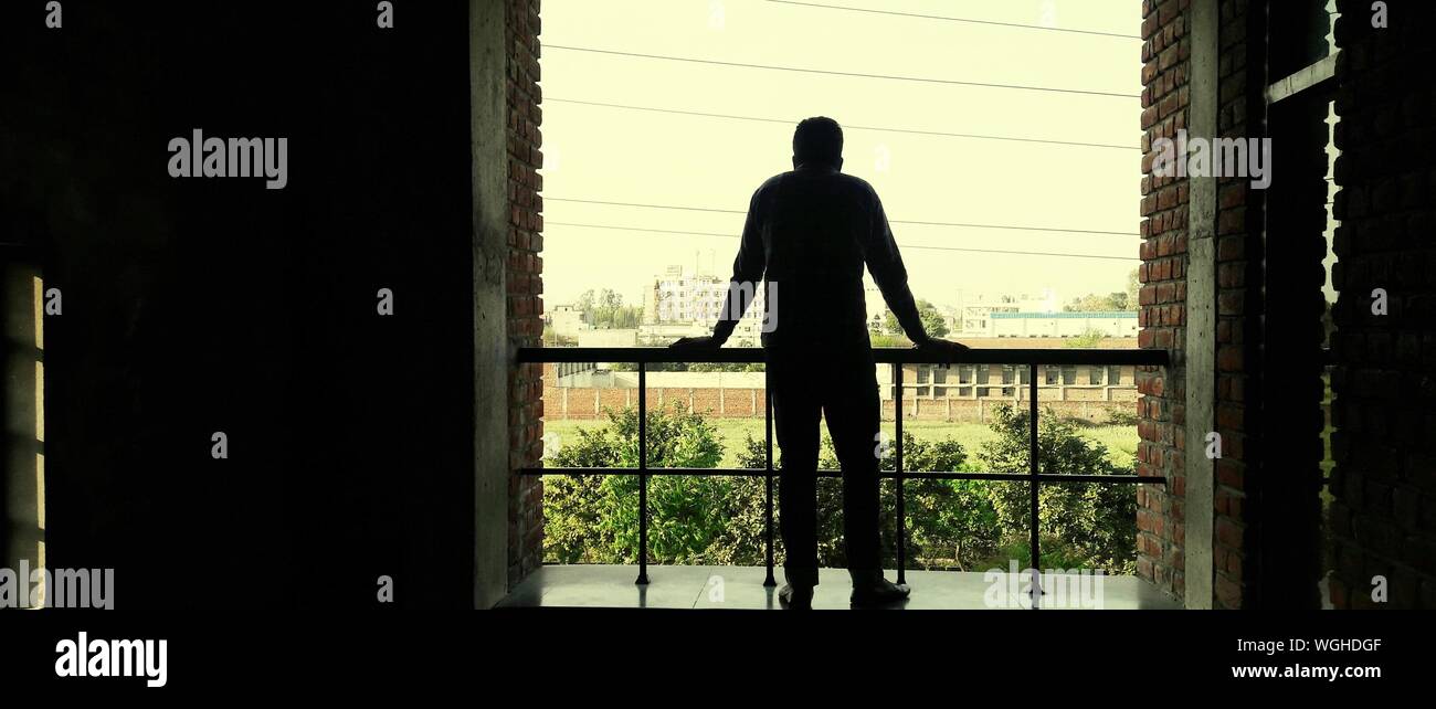 Man from rear balcony hi-res stock photography and images - Alamy
