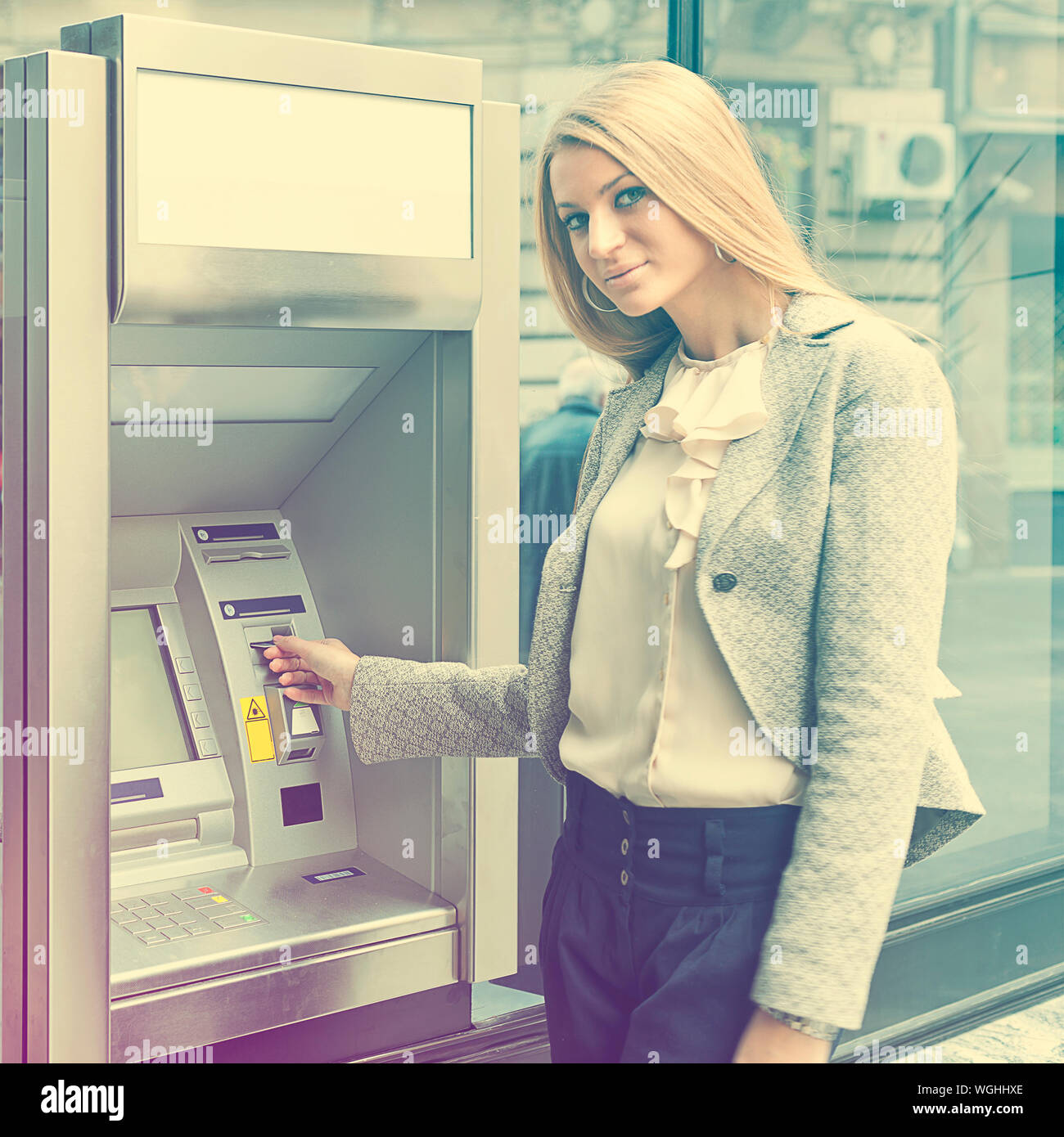 Woman at the atm hi-res stock photography and images - Alamy