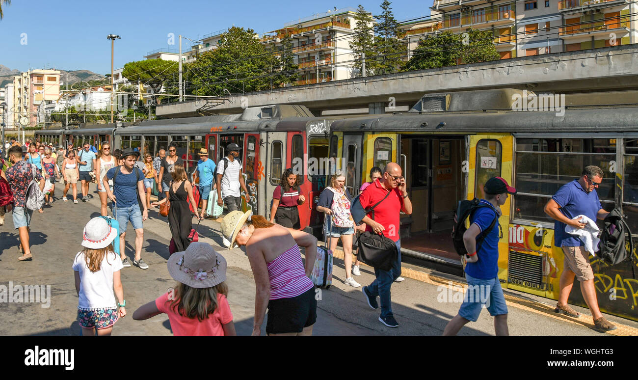 SORRENTO, ITALY - AUGUST 2019: People getting off a train after ...