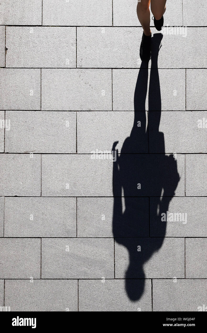 Side view shadow walking hi-res stock photography and images - Alamy