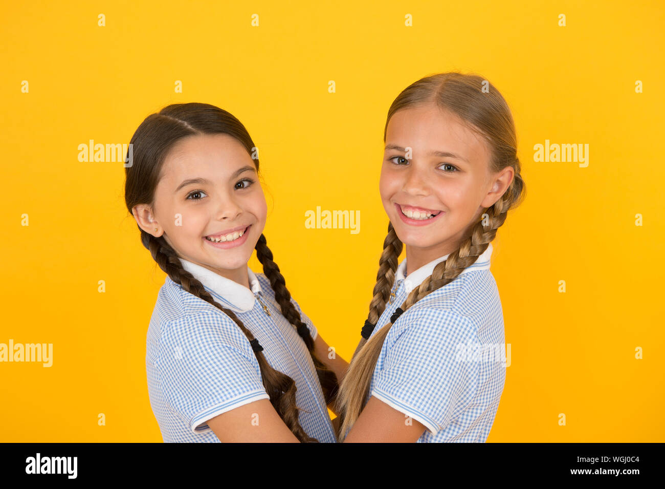 happy friends on yellow background. fashion beauty. childhood happiness ...