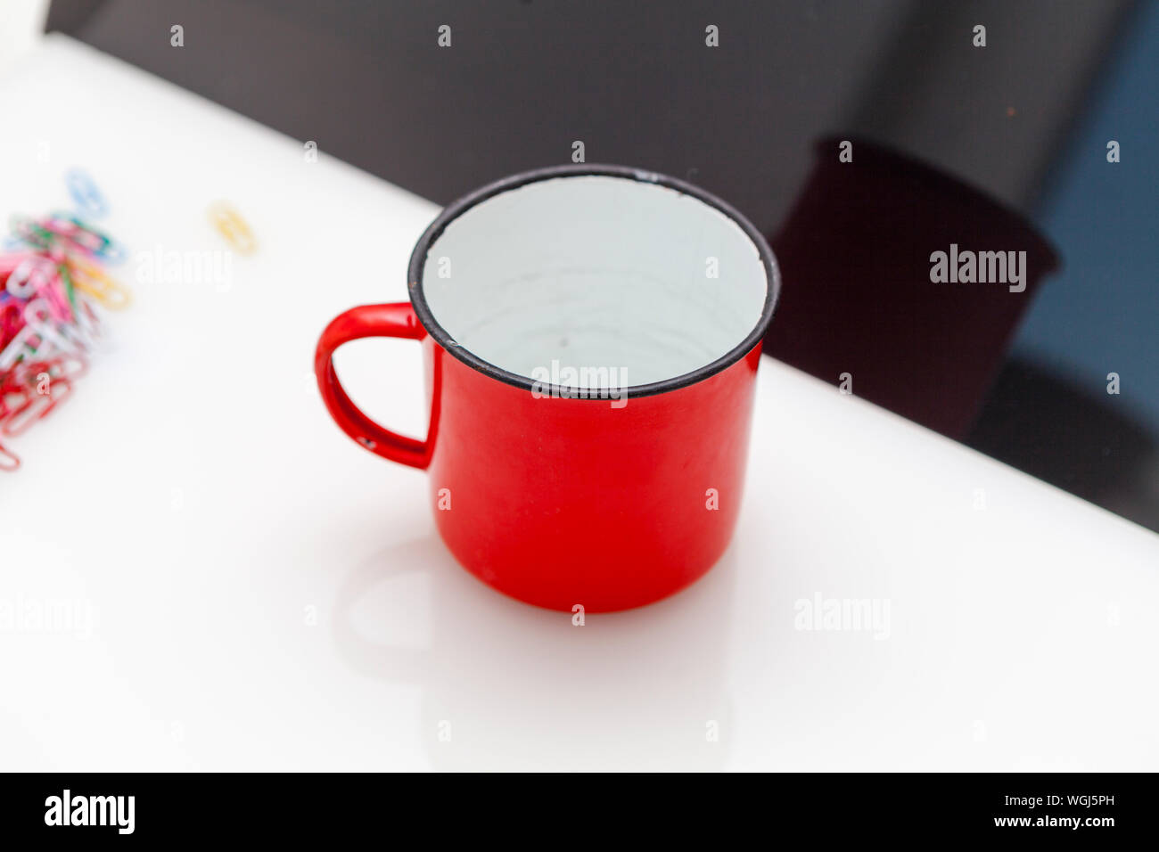 Empty coffee cup on red table hi-res stock photography and images - Alamy