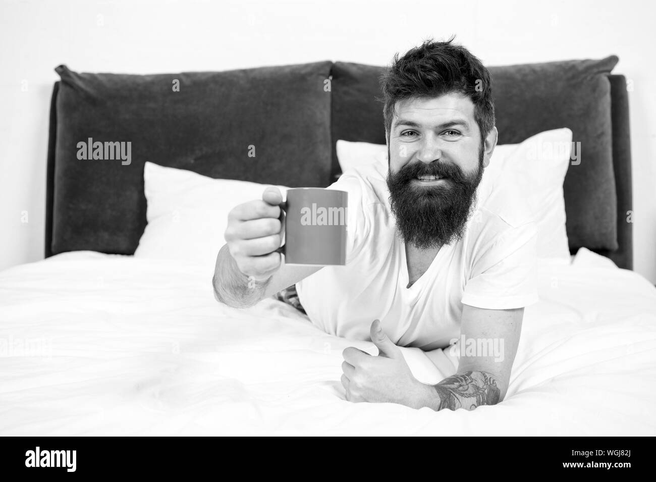 Man awakening on bed Black and White Stock Photos & Images - Alamy