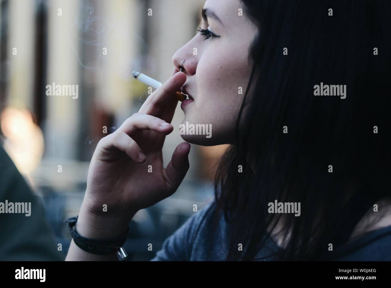 Woman Nose Smoke High Resolution Stock Photography and Images - Alamy