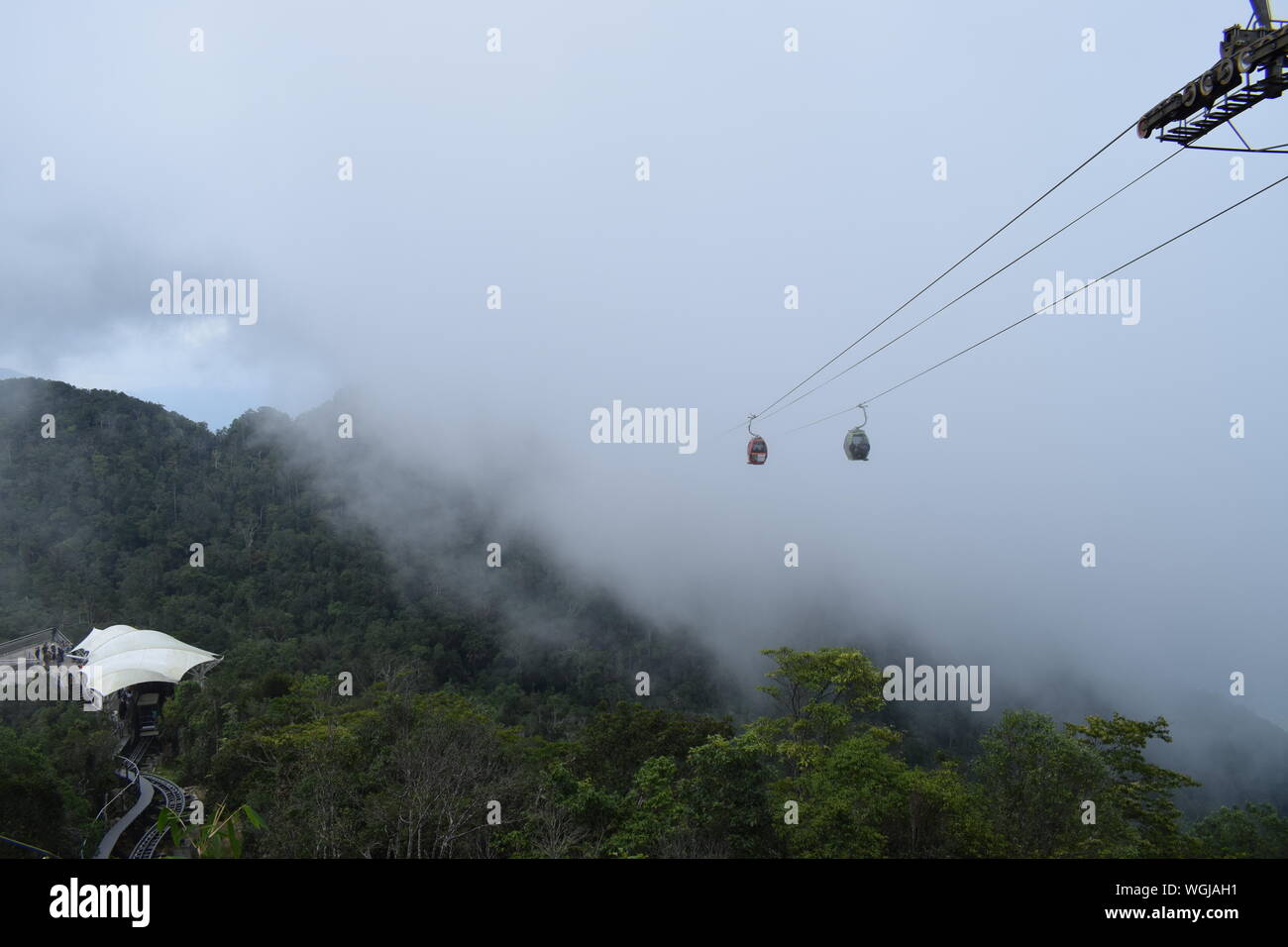 Cable Cars in Cloud and Mountain Stock Photo - Alamy