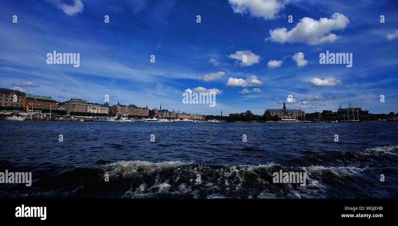 View Of City At Waterfront Stock Photo - Alamy