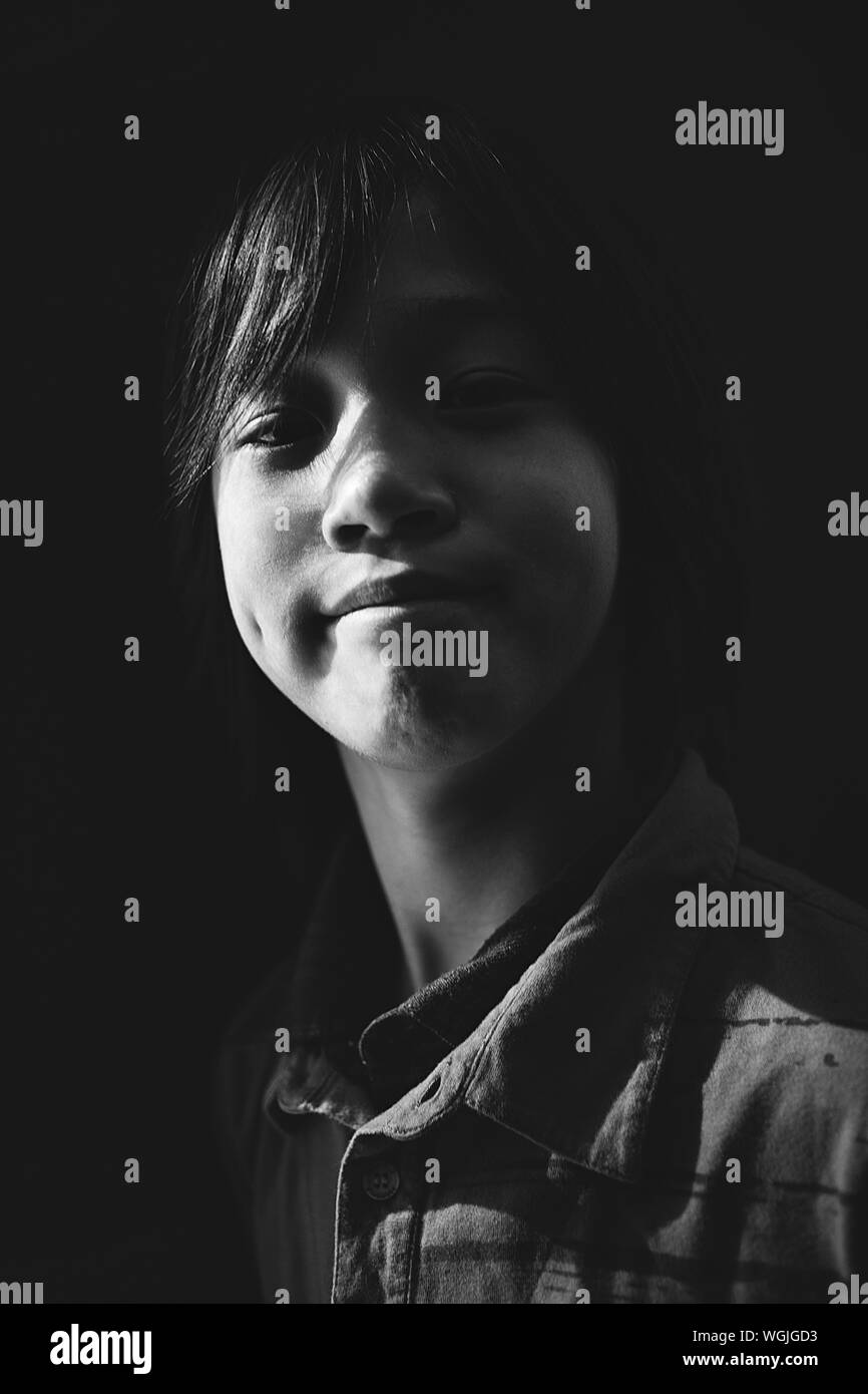 Dark boy hi-res stock photography and images - Alamy