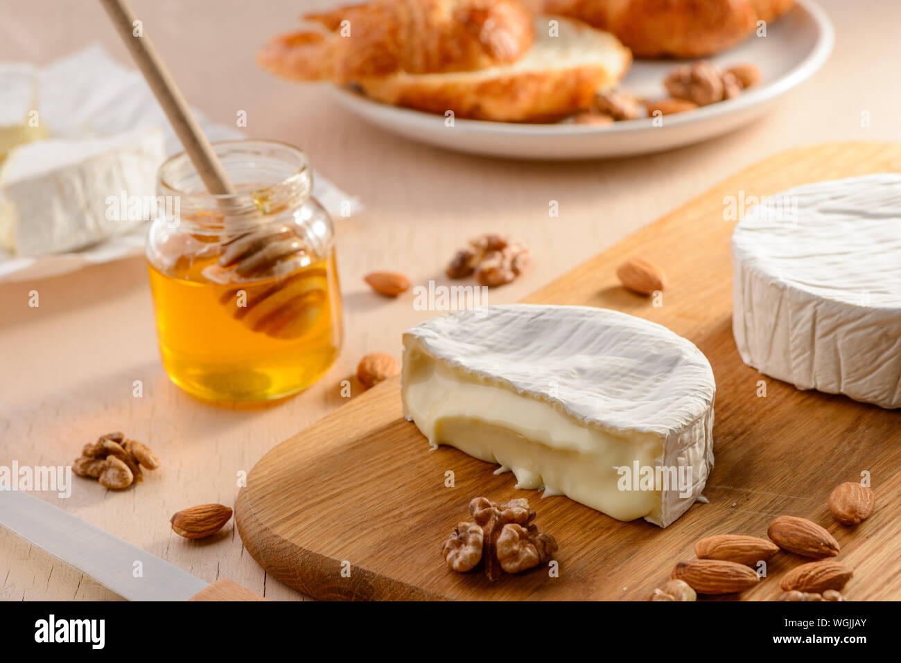 Brie cheese with runny texture Stock Photo - Alamy