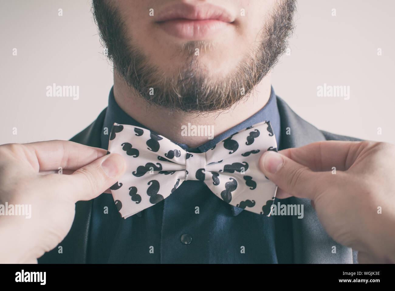 Tie tying hi-res stock photography and images - Alamy