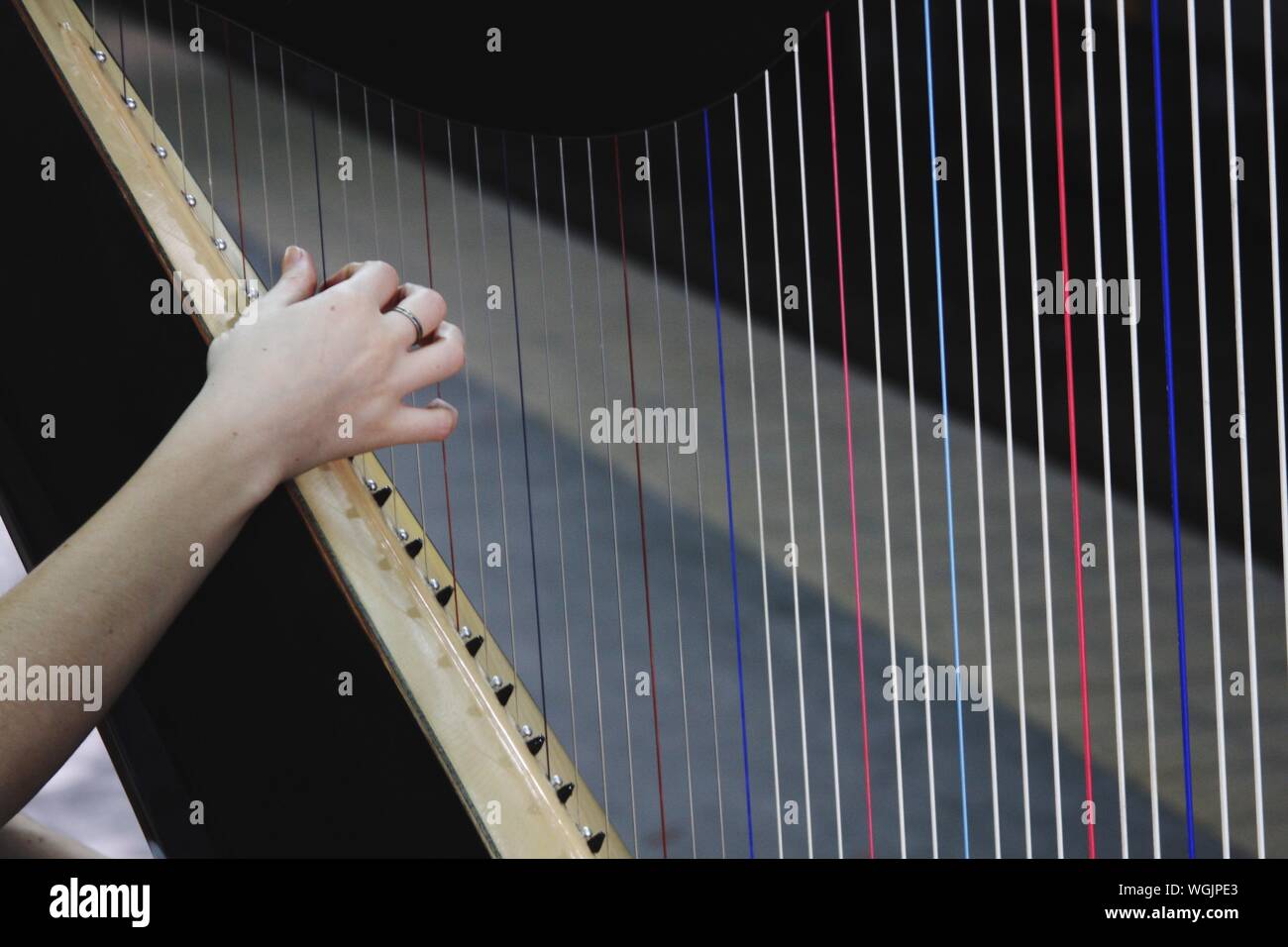 Close up playing harp hi-res stock photography and images - Alamy
