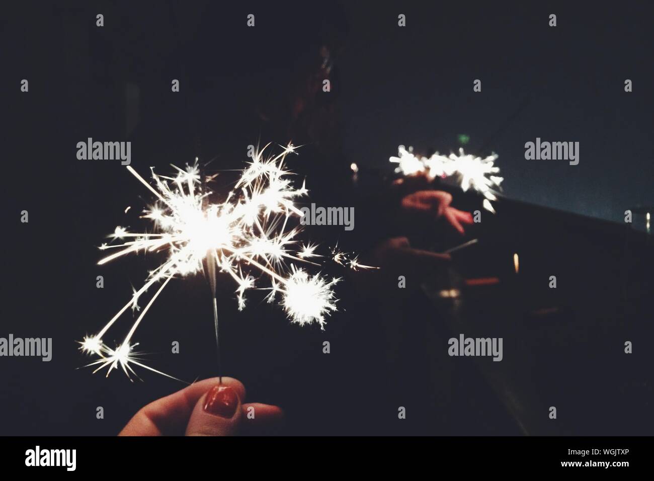 Hand Fireworks High Resolution Stock Photography and Images - Alamy