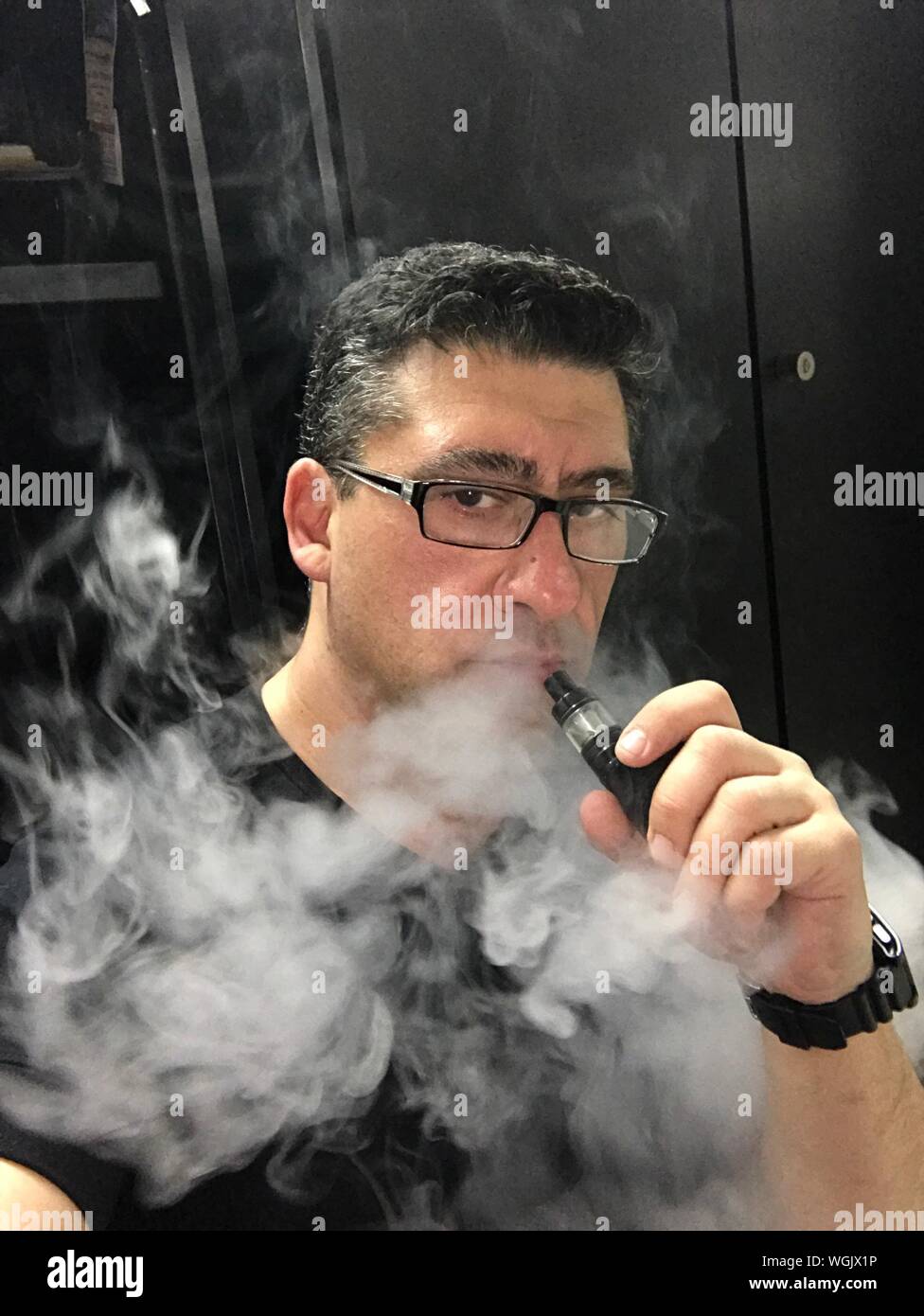 Portrait man smoking hi-res stock photography and images - Alamy