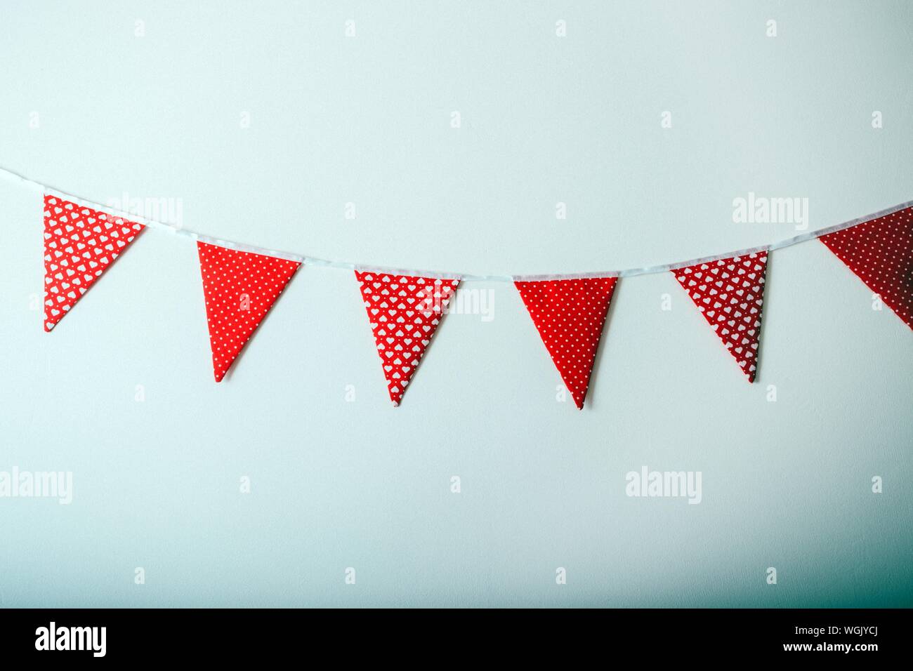 colorful party flags made of paper on a white background Stock Photo ...