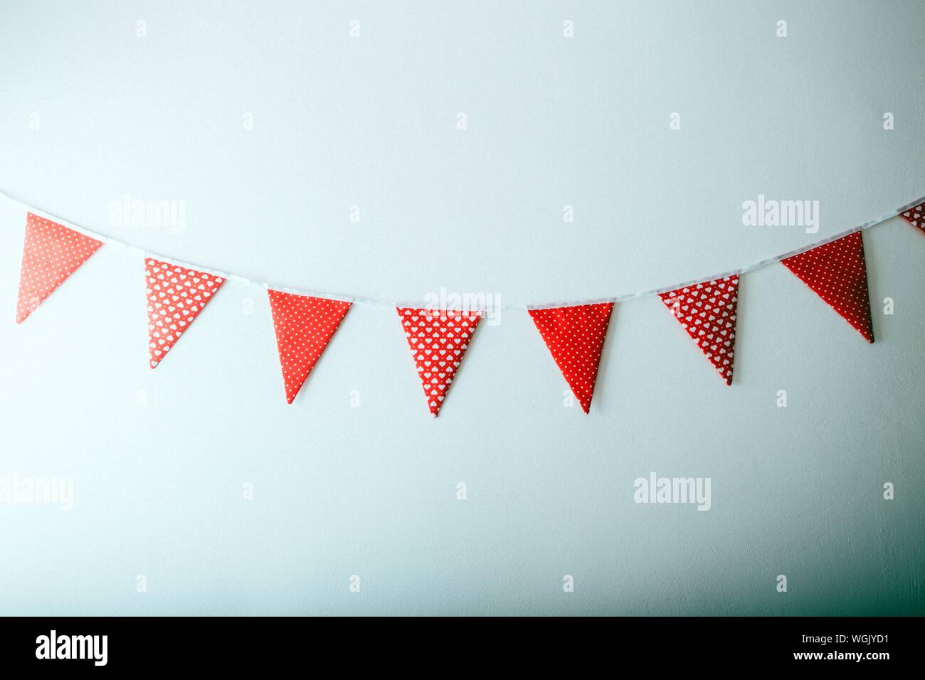 colorful party flags made of paper on a white background Stock Photo ...