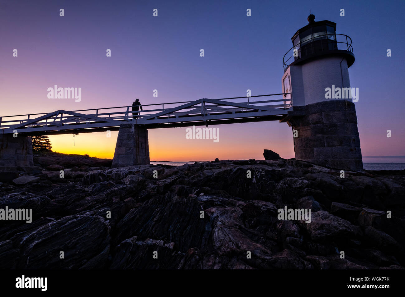 Dawn breaks over the Marshall Point Lighthouse near Port Clyde, Maine ...