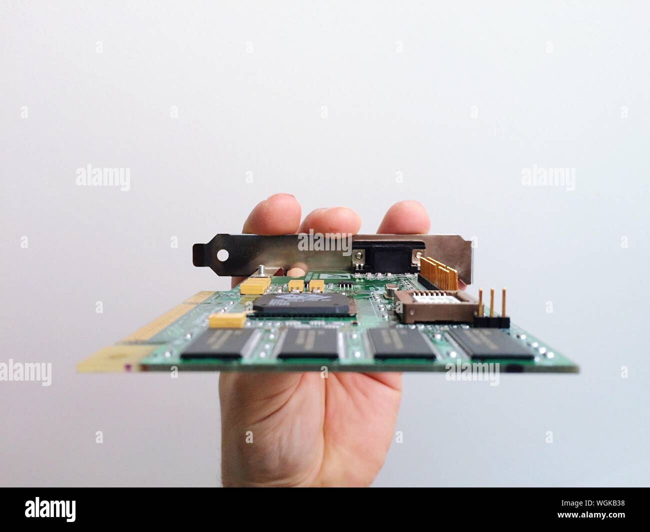 Hand holding circuit board hi-res stock photography and images - Alamy