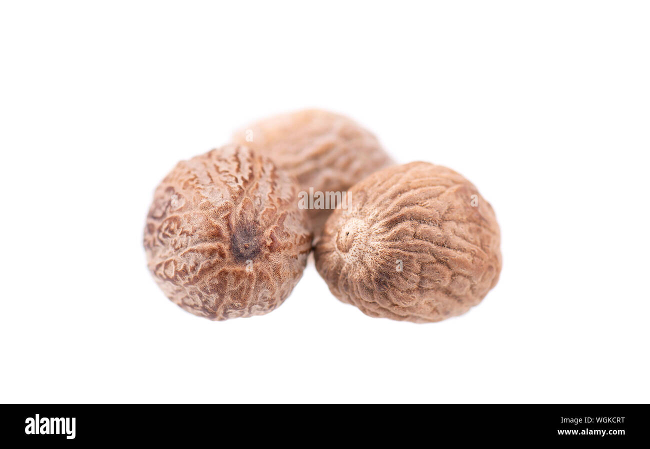 Nutmeg isolated on white background. Two dry whole nutmeg. Clipping ...