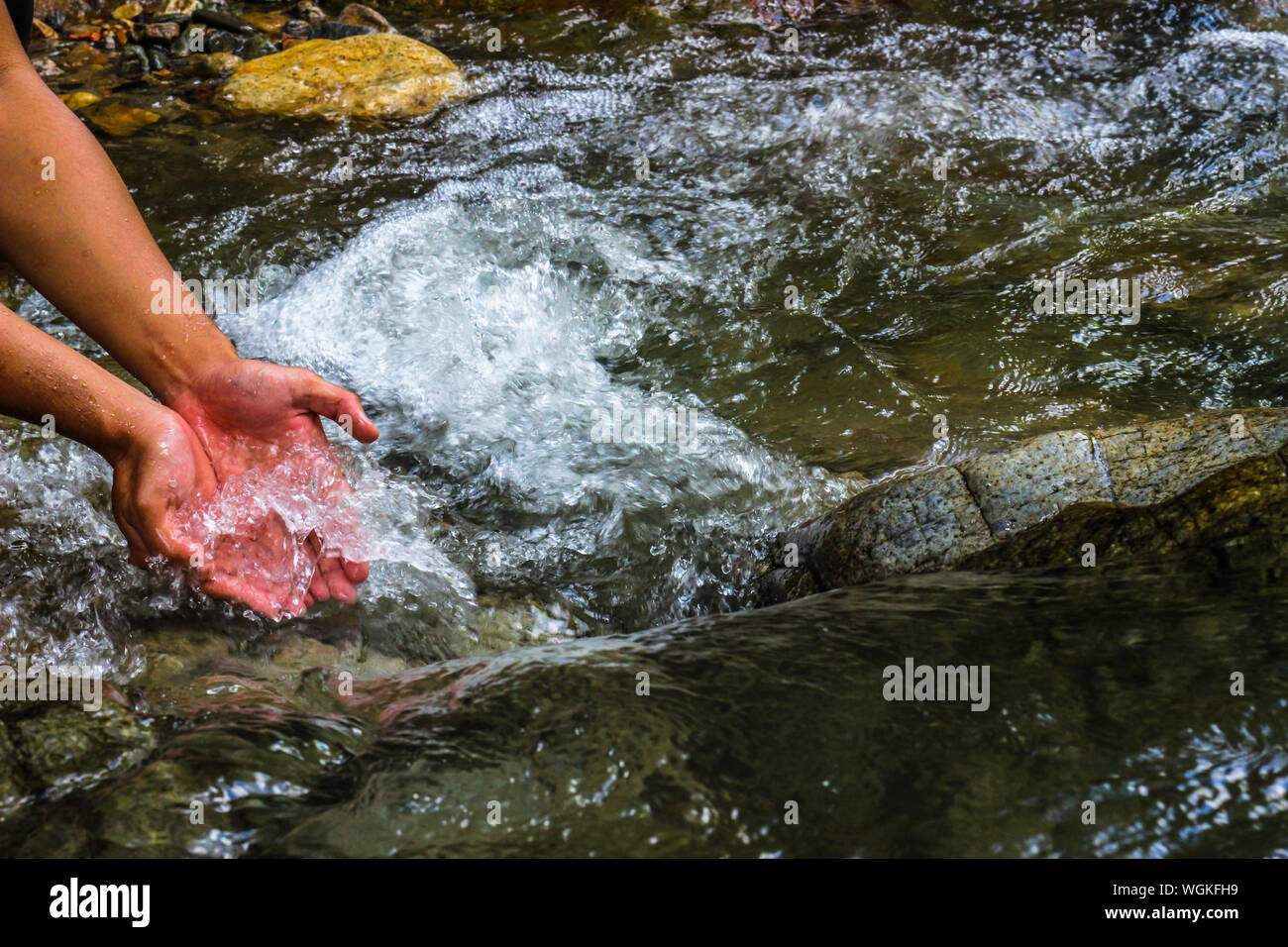Hands and water hi-res stock photography and images - Alamy