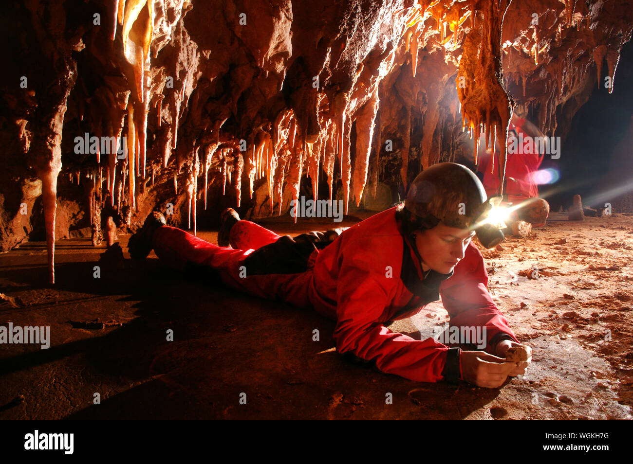 Man lying down in cave hi-res stock photography and images - Alamy