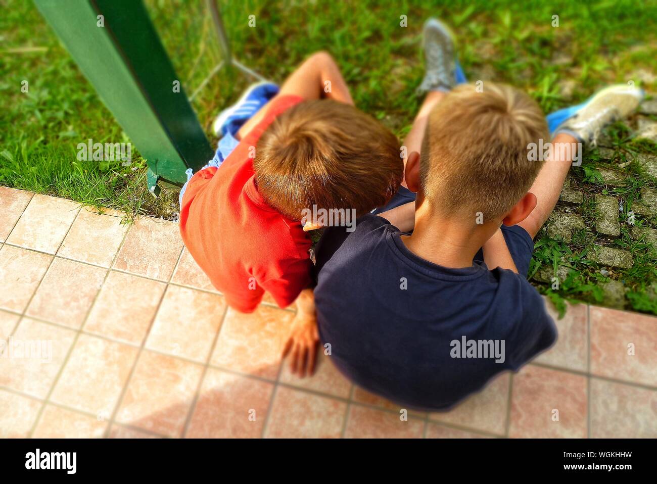 Family sitting on front porch hi-res stock photography and images - Alamy