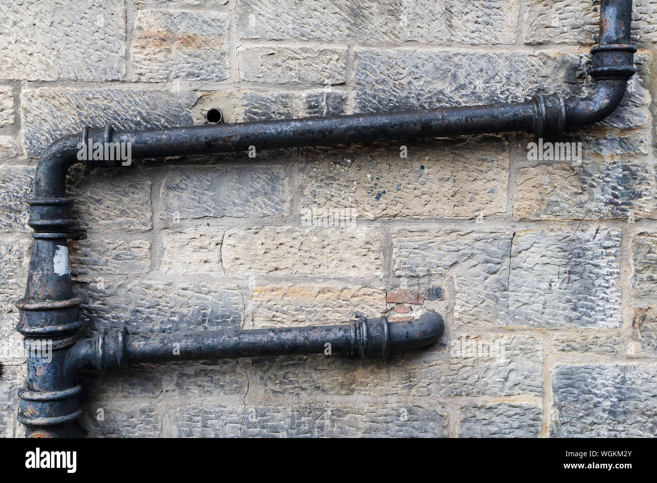 Old Pipes On Wall High Resolution Stock Photography and Images - Alamy