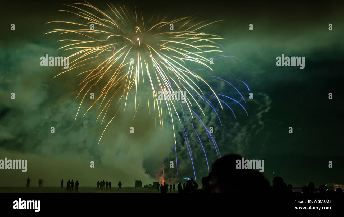 Firework Display At Night Stock Photo - Alamy