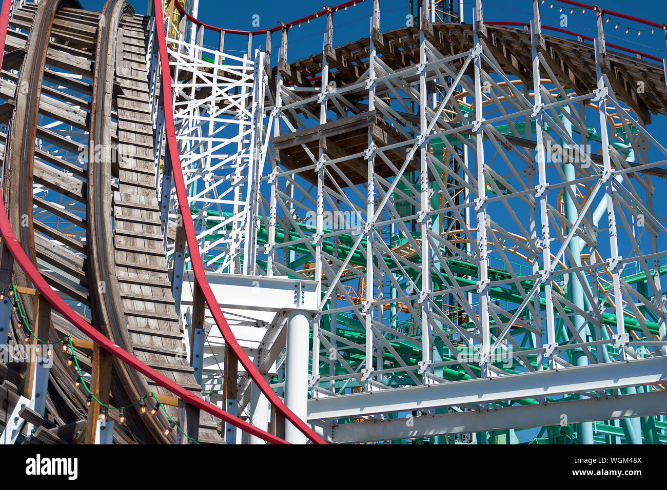 Part of a roller coaster in amusement park Stock Photo - Alamy