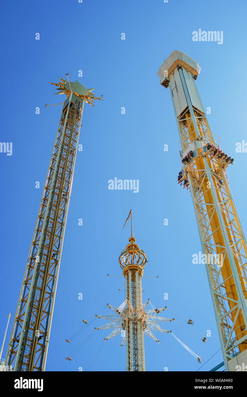 Flying swinging high chained carousel and Lifting up machine in ...