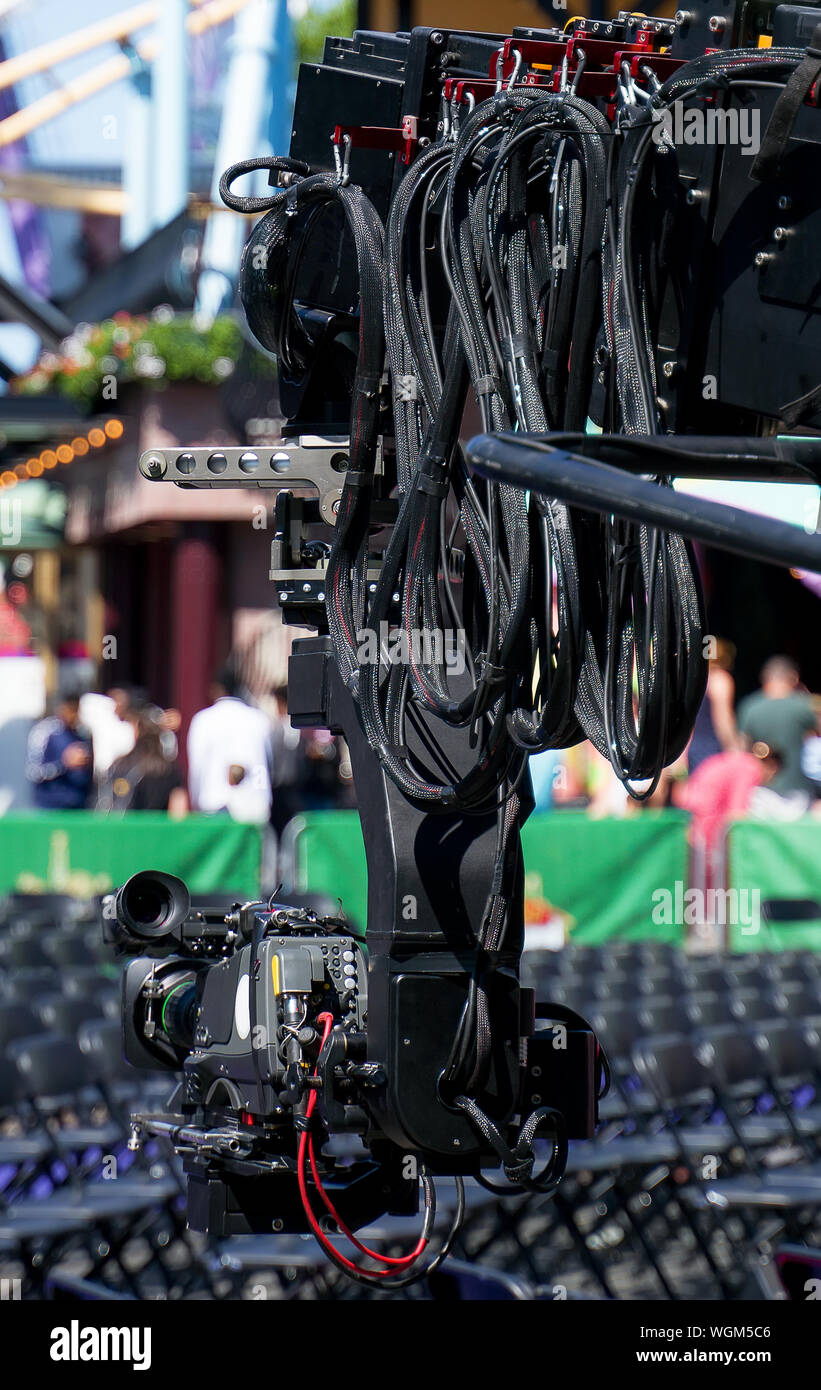 Professional video camera on automated motorized arm Stock Photo - Alamy