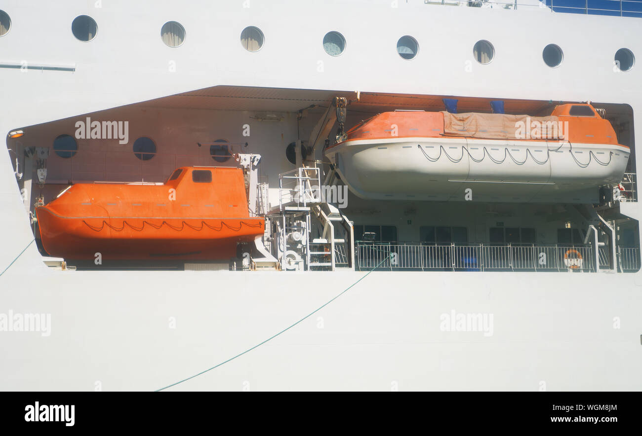 Orange lifeboats on the deck of ferry Stock Photo - Alamy