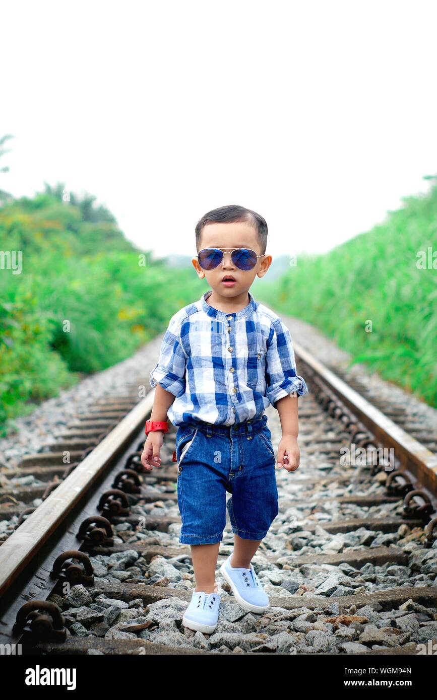 Railroad tracks boy hi-res stock photography and images - Alamy
