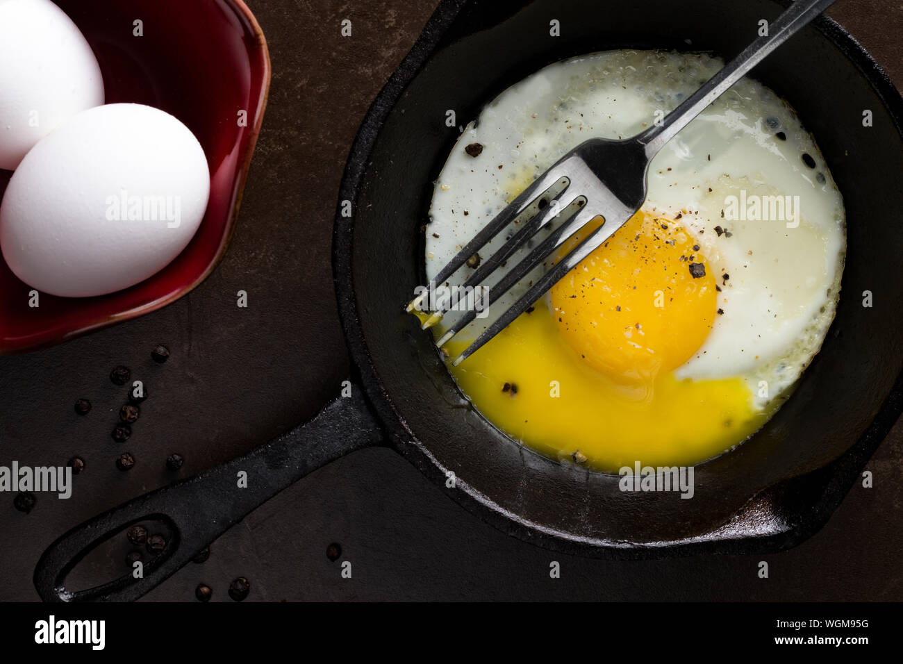 Broken yolk hi-res stock photography and images - Alamy
