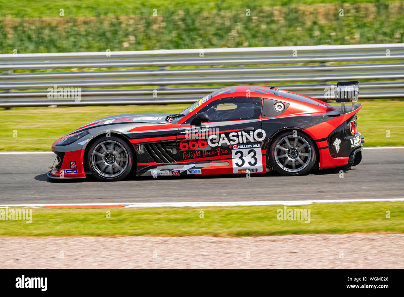Crash barrier racing circuit hi-res stock photography and images - Alamy