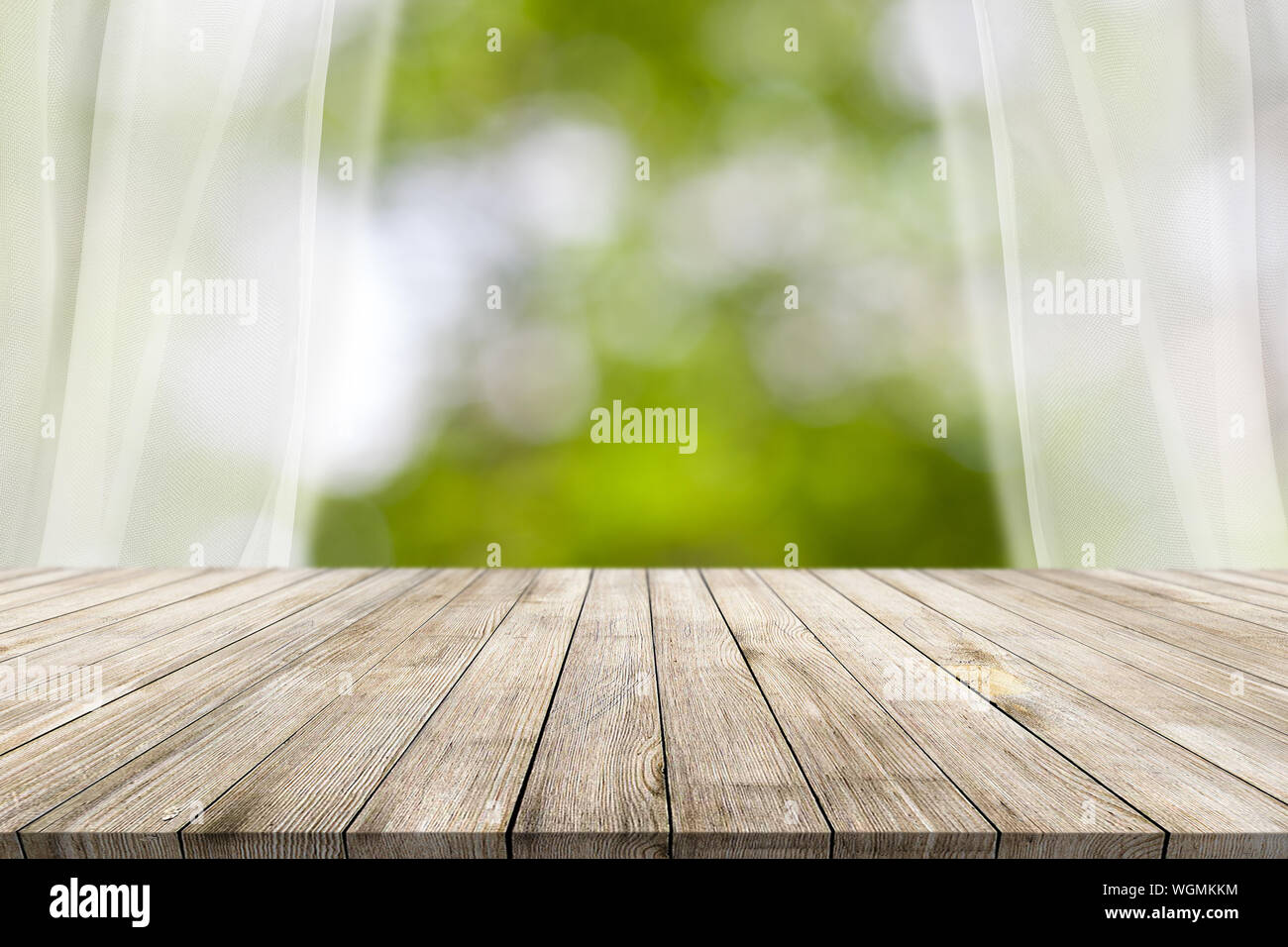 Wooden desk on blur or abstract natural background Stock Photo - Alamy