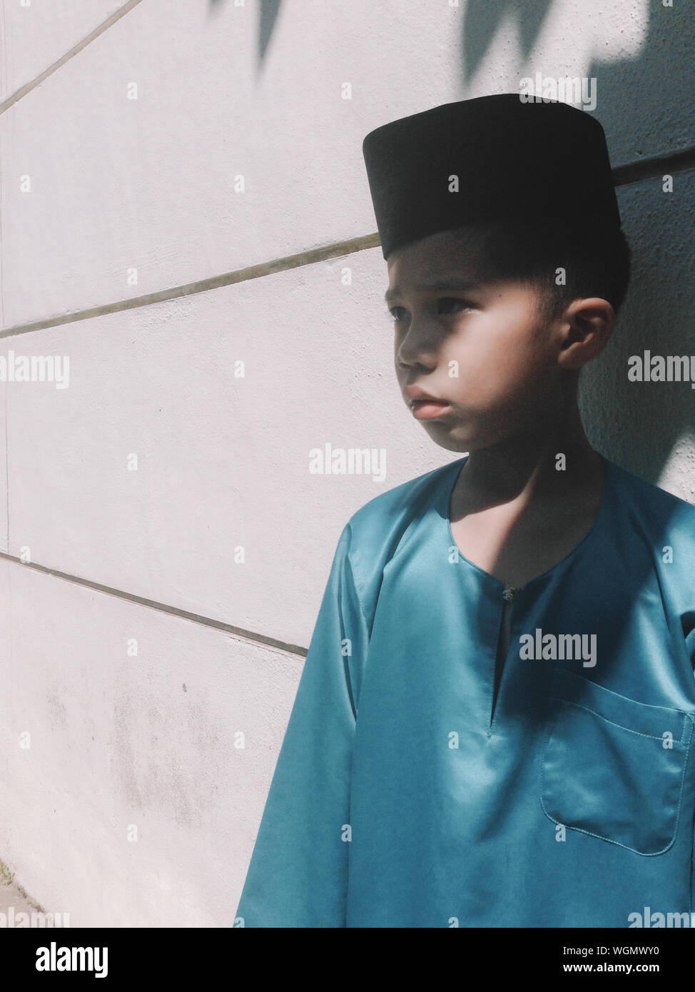 Child wearing cap hi-res stock photography and images - Alamy