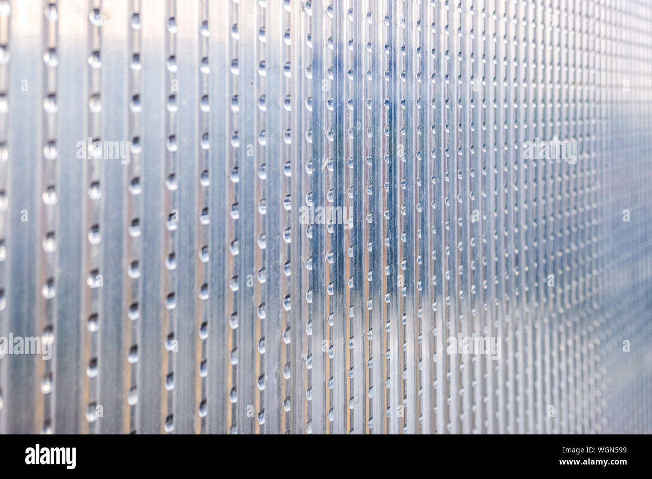 Metallic texture of an aluminum plate with slits for use as an ...