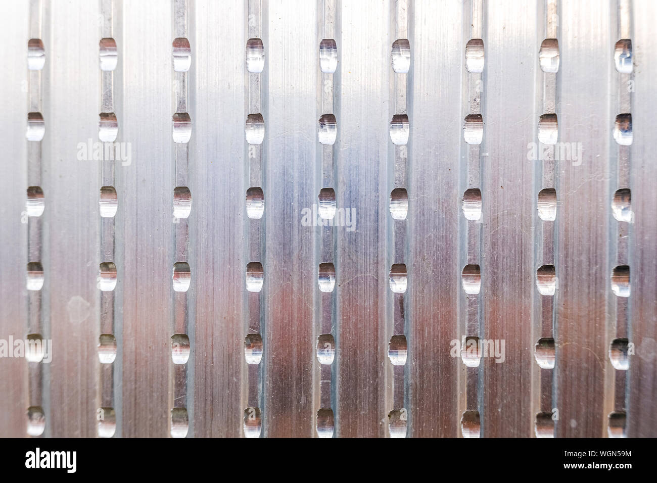 Metallic texture of an aluminum plate with slits for use as an ...