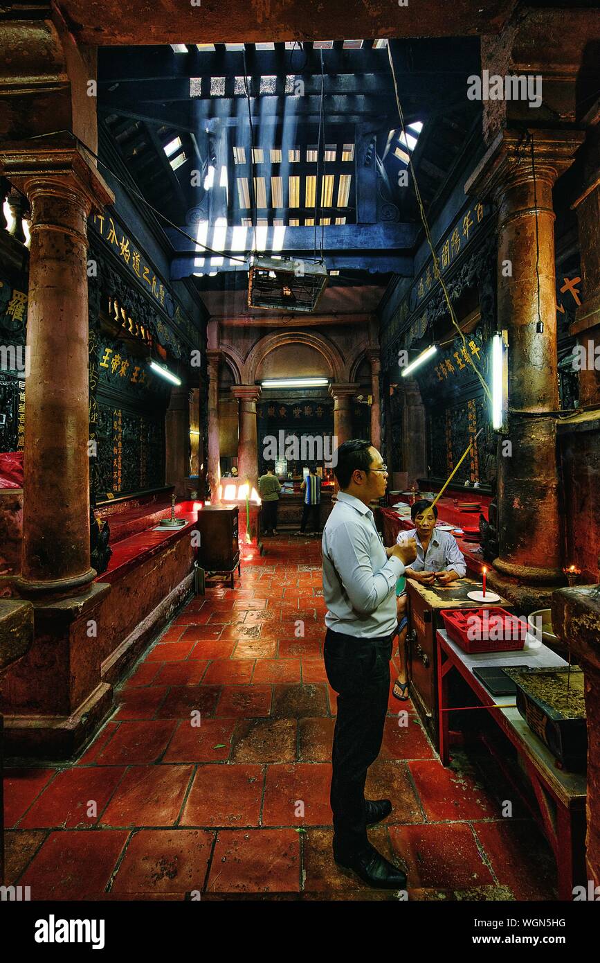 Two standing men praying hi-res stock photography and images - Alamy