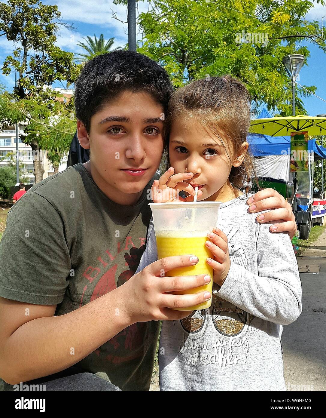 Tree boy girl hi-res stock photography and images - Alamy