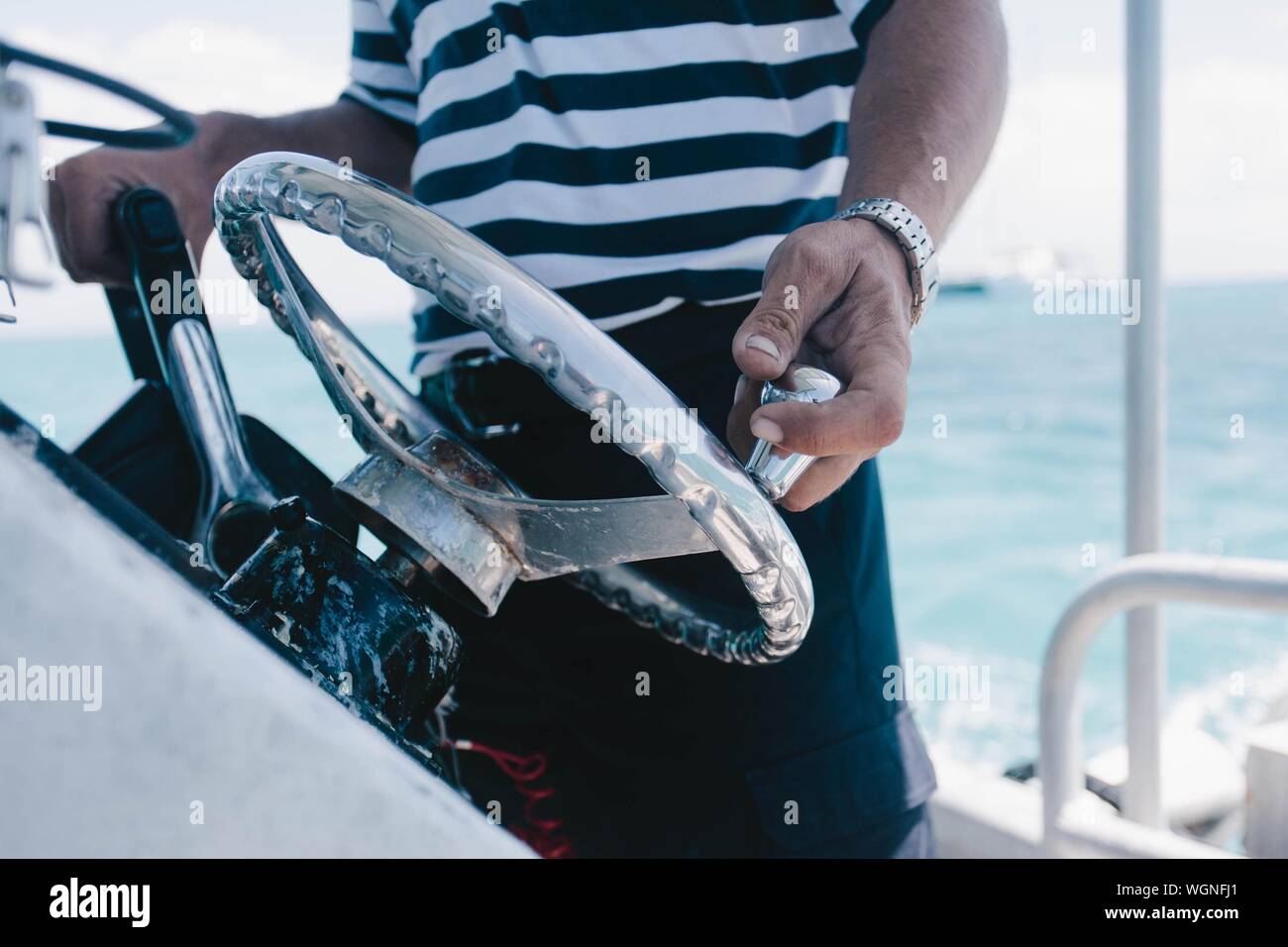 Man riding boat hi-res stock photography and images - Alamy